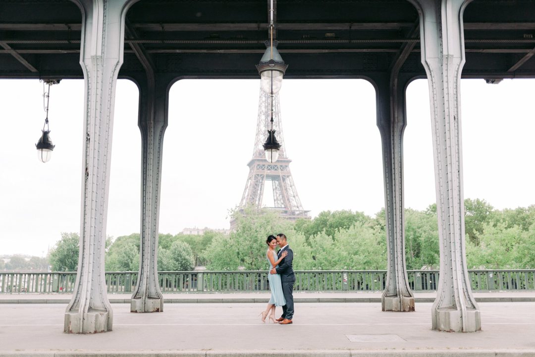 A romantic love session on one of the bridges in Paris for an Eiffel ...